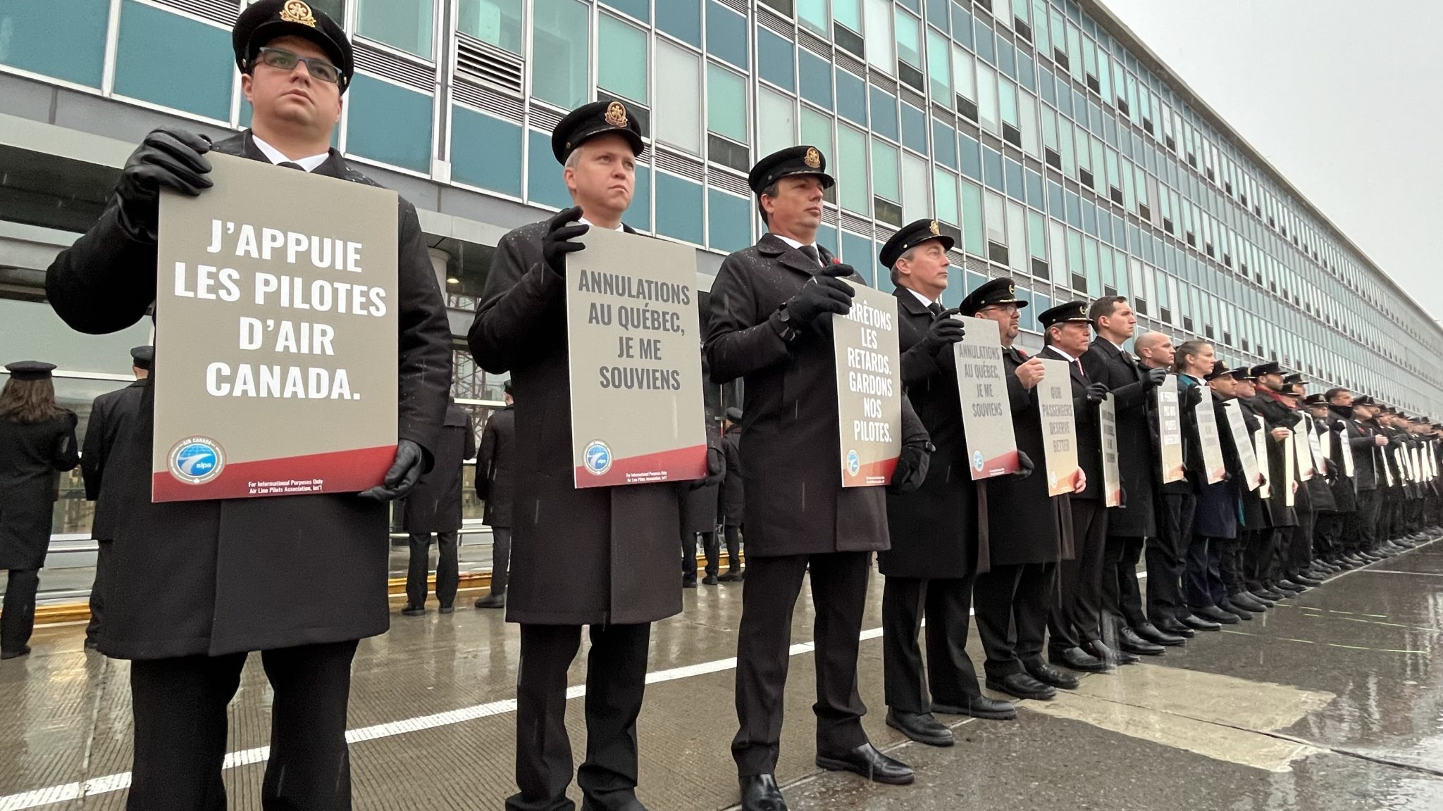 Air Canada pilots picket at Montreal’s Trudeau airport, demanding ...