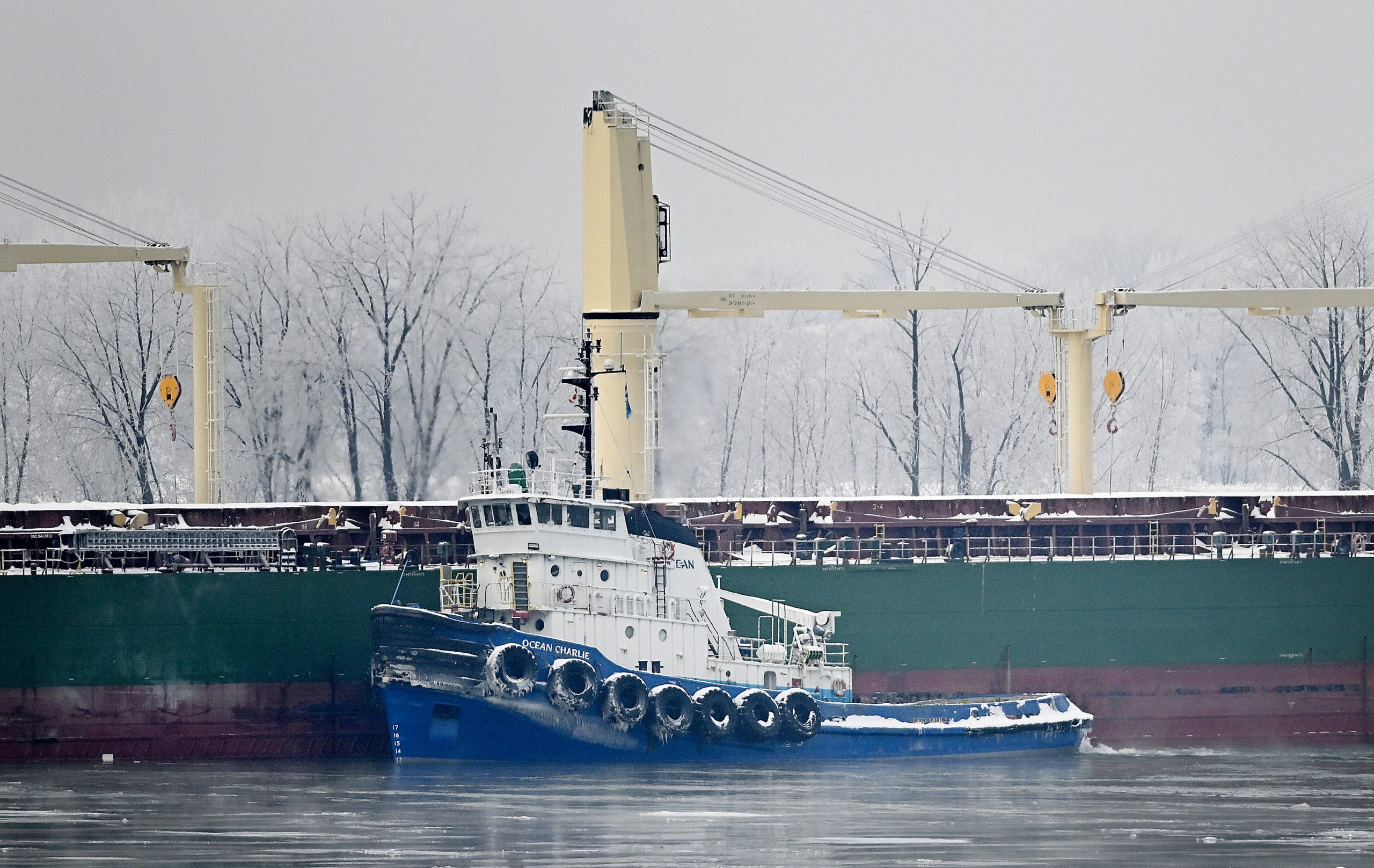 Tugboats, crews try to refloat ship stuck in St. Lawrence River near ...