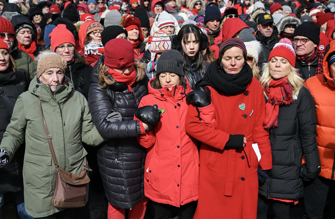 Anti-Trump demonstrators rally cities across Quebec for women's rights