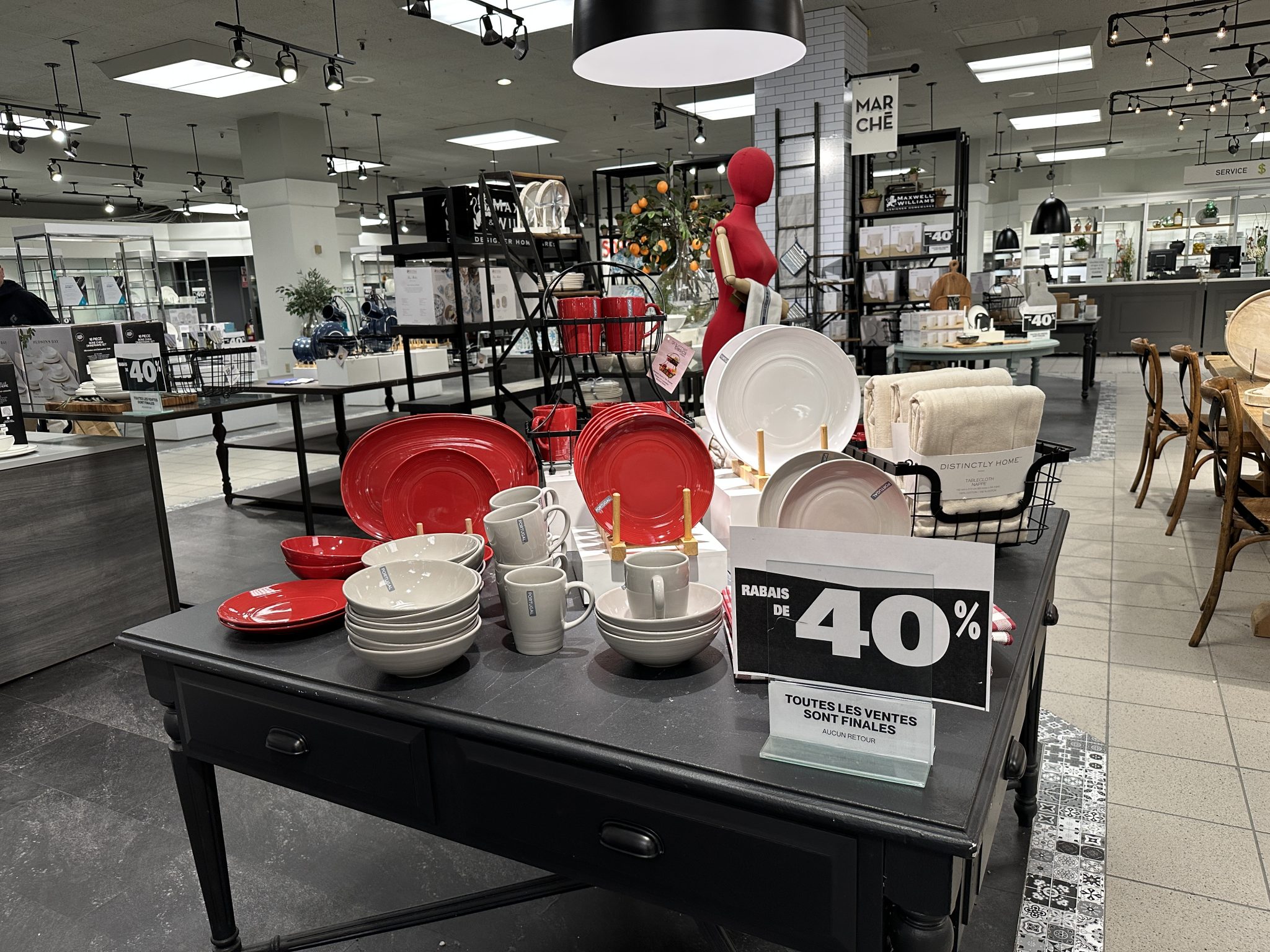 Shoppers look for iconic striped merchandise as Hudson's Bay begins ...