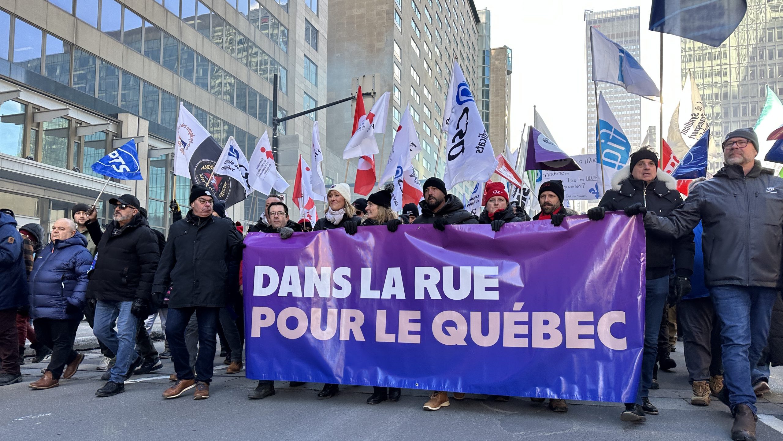 Downtown Montreal packed as thousands rally against anti-union measures ...