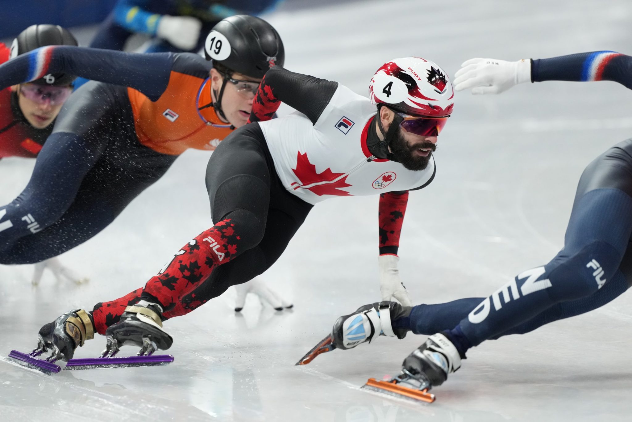 Quebec's Steven Dubois wins gold in men's 500m short track speed skating